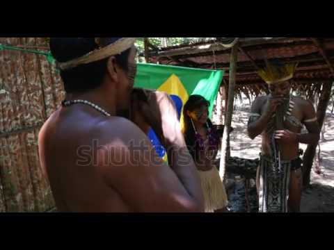 Native Brazilians doing their ritual at an indigenous tribe in the Amazon
