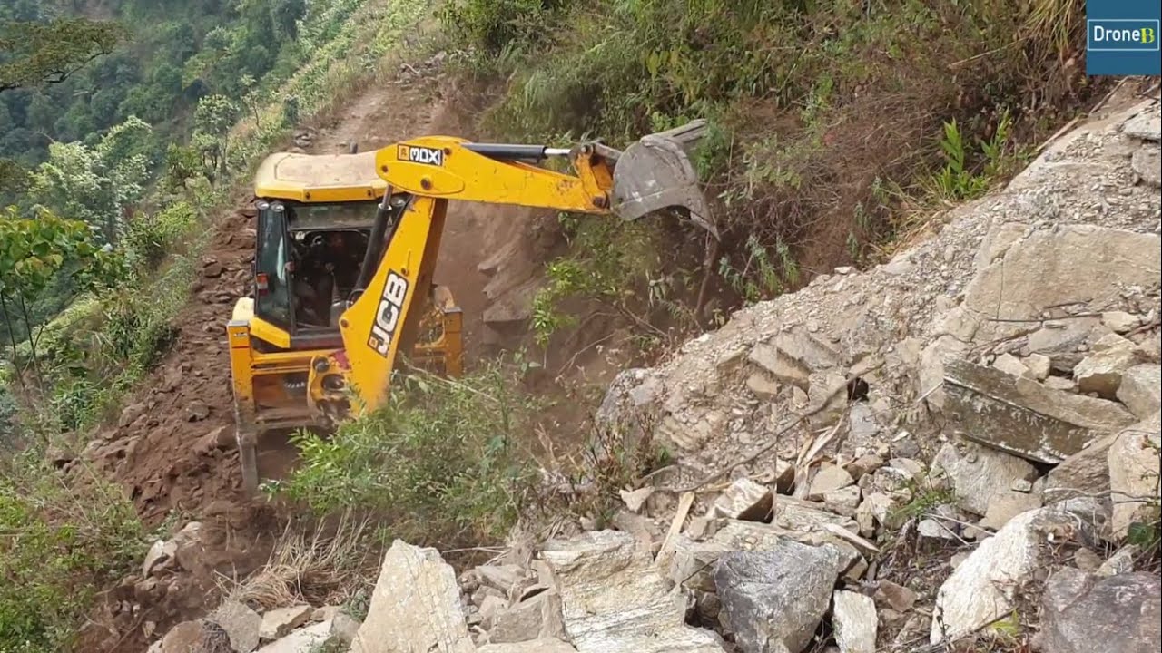 Landslide-Blocked Hilly Road-JCB Backhoe Loader-Clearing the Road - YouTube