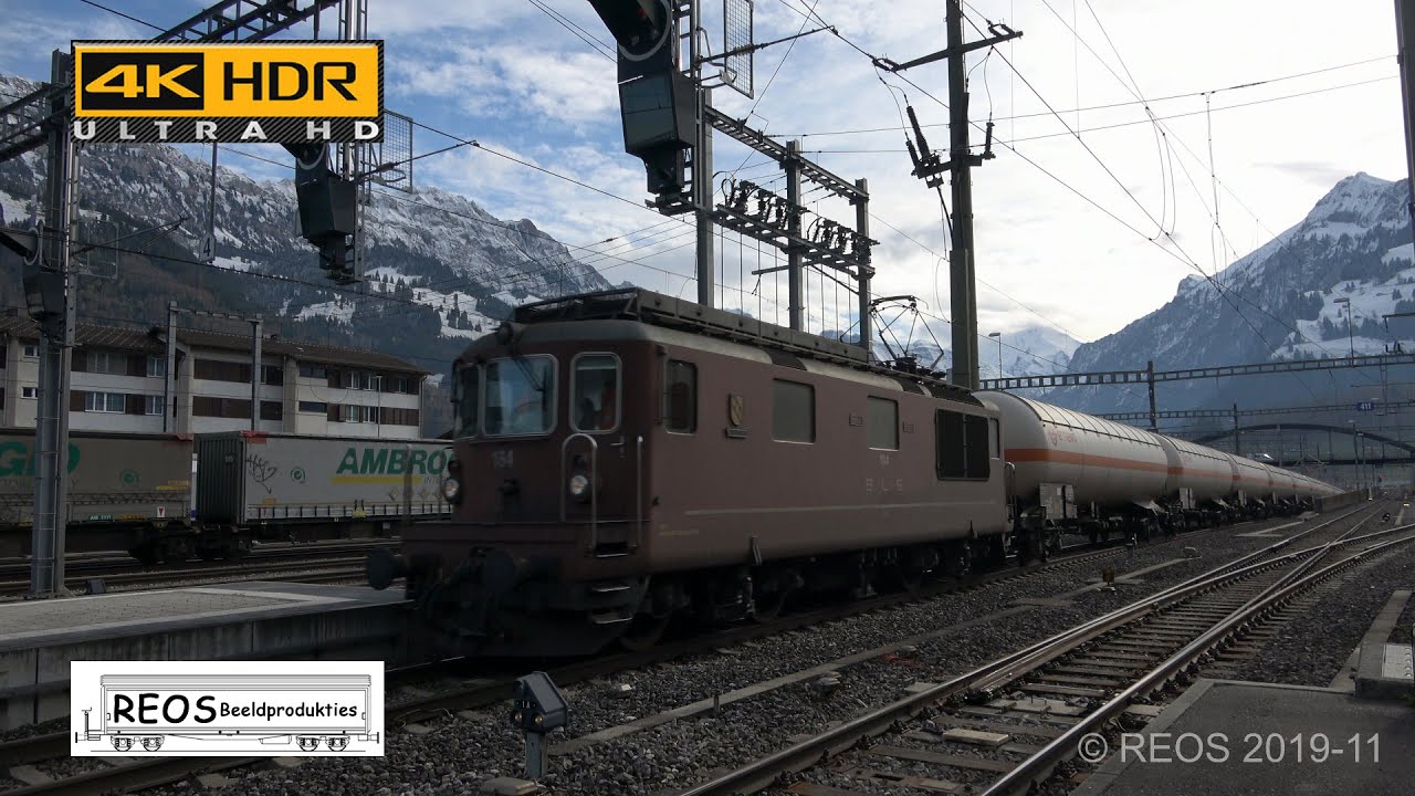 2019-11-11 [4K] Bahnhof Frutigen in the afternoon - some freight and ...