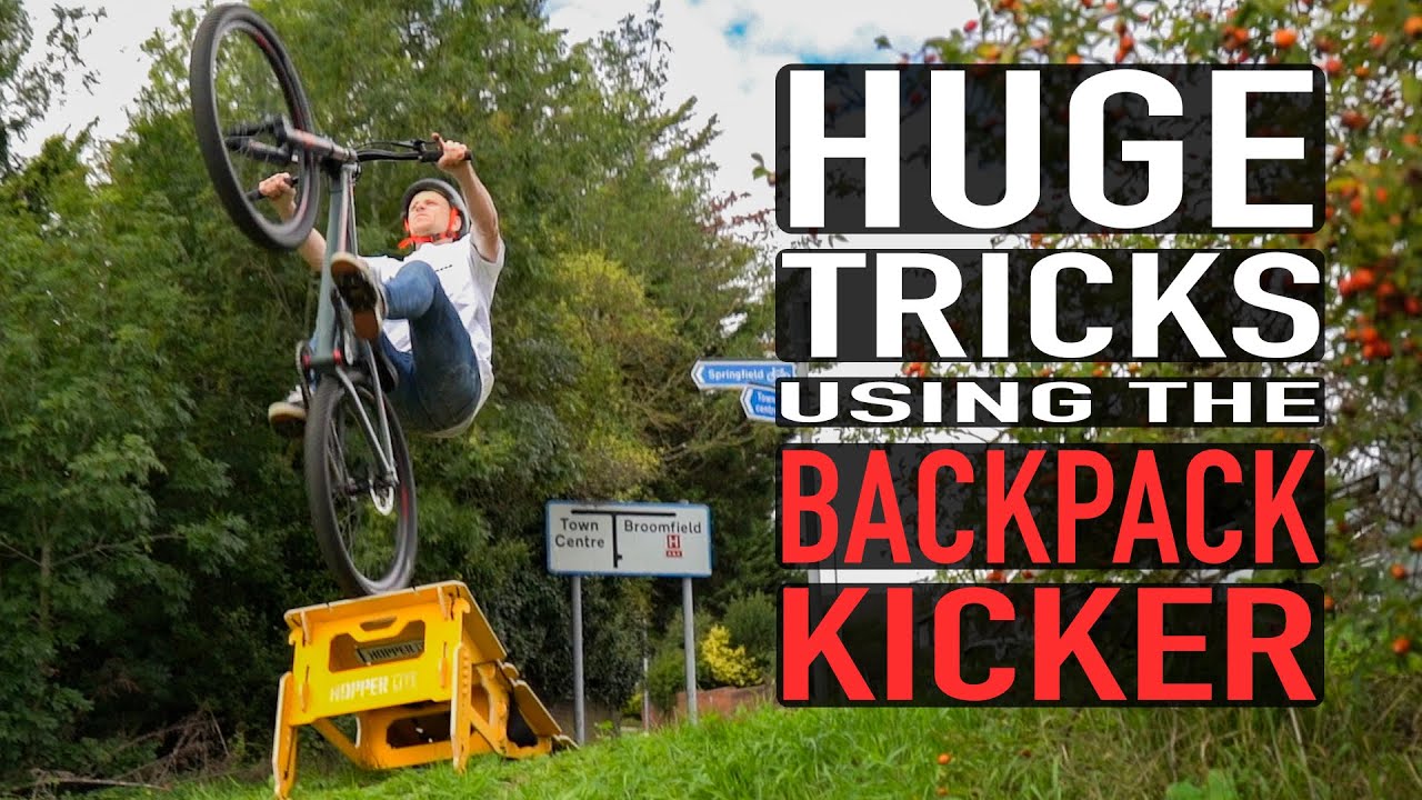 HUGE TRICKS USING THE BACKPACK KICKER// URBAN MTB RIDING - YouTube