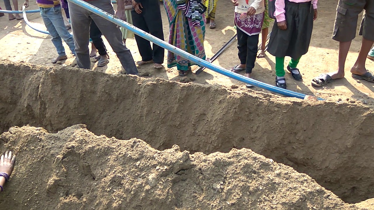 Optical fibre cable (OFC) laying by trencher machine - YouTube