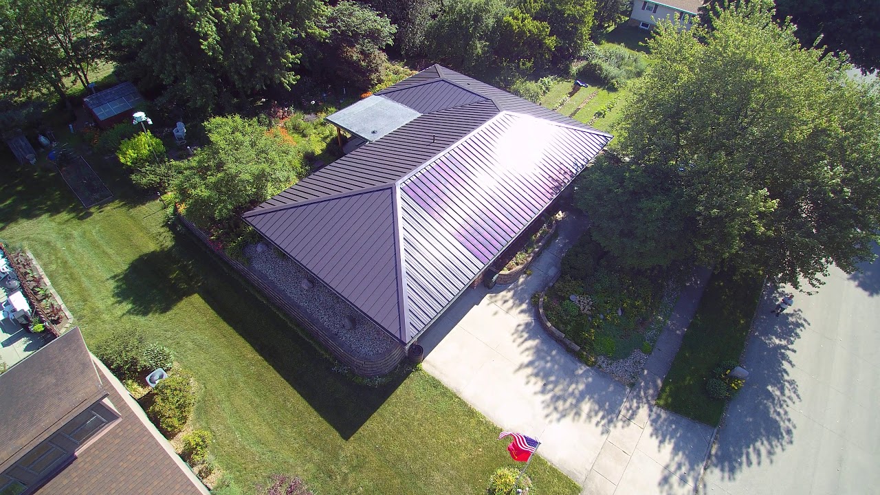 Solar Panels on Metal Roof - YouTube
