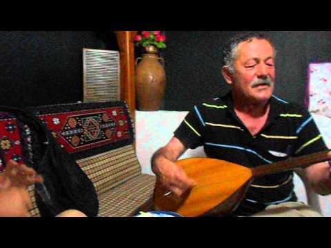 AŞIK  BİRKAN  TELLİ