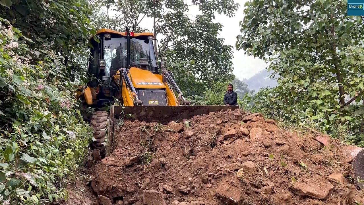Leveling Narrow Road Through Dense Mountain Forest with JCB Backhoe ...