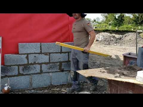 how to build block brick corners on a timberframe house - YouTube