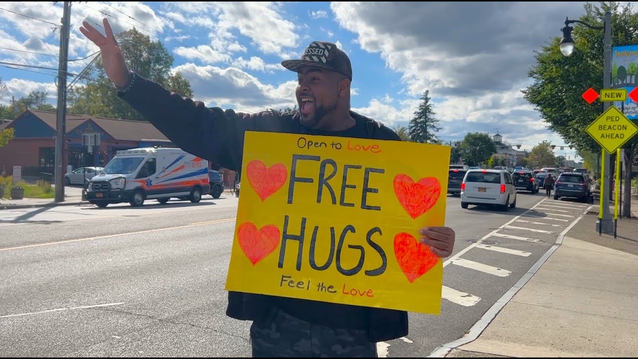 Local youth pastor offering free hugs to help spread love to the ...
