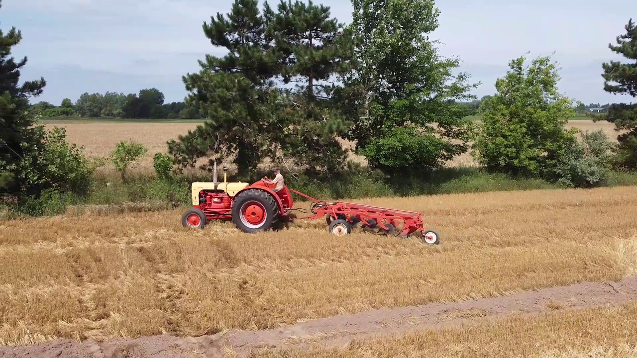 Case tractors plowing - YouTube