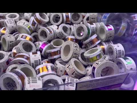 Winning ticket rolls at the claw machine - YouTube