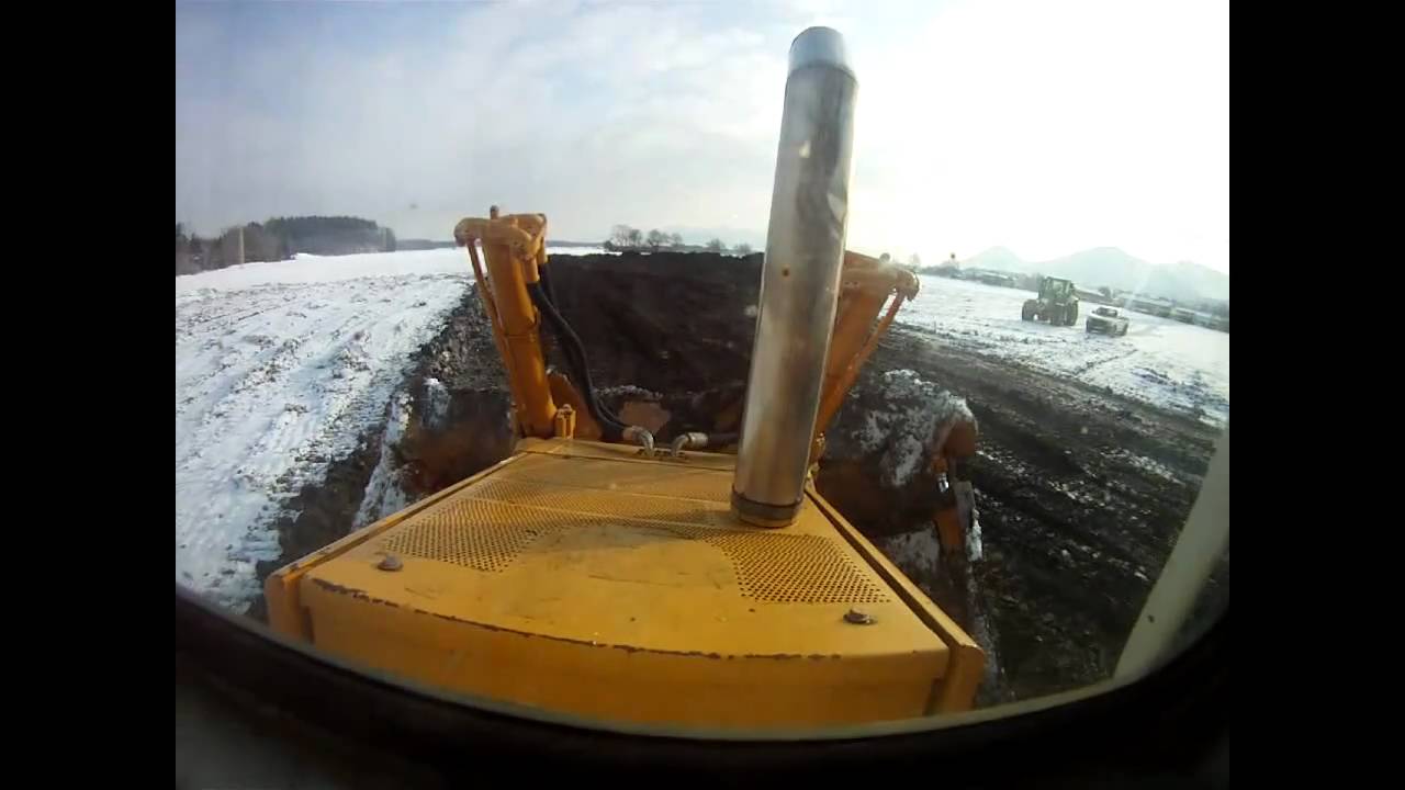 Dozer Pushing Dirt Liebherr 712 - YouTube