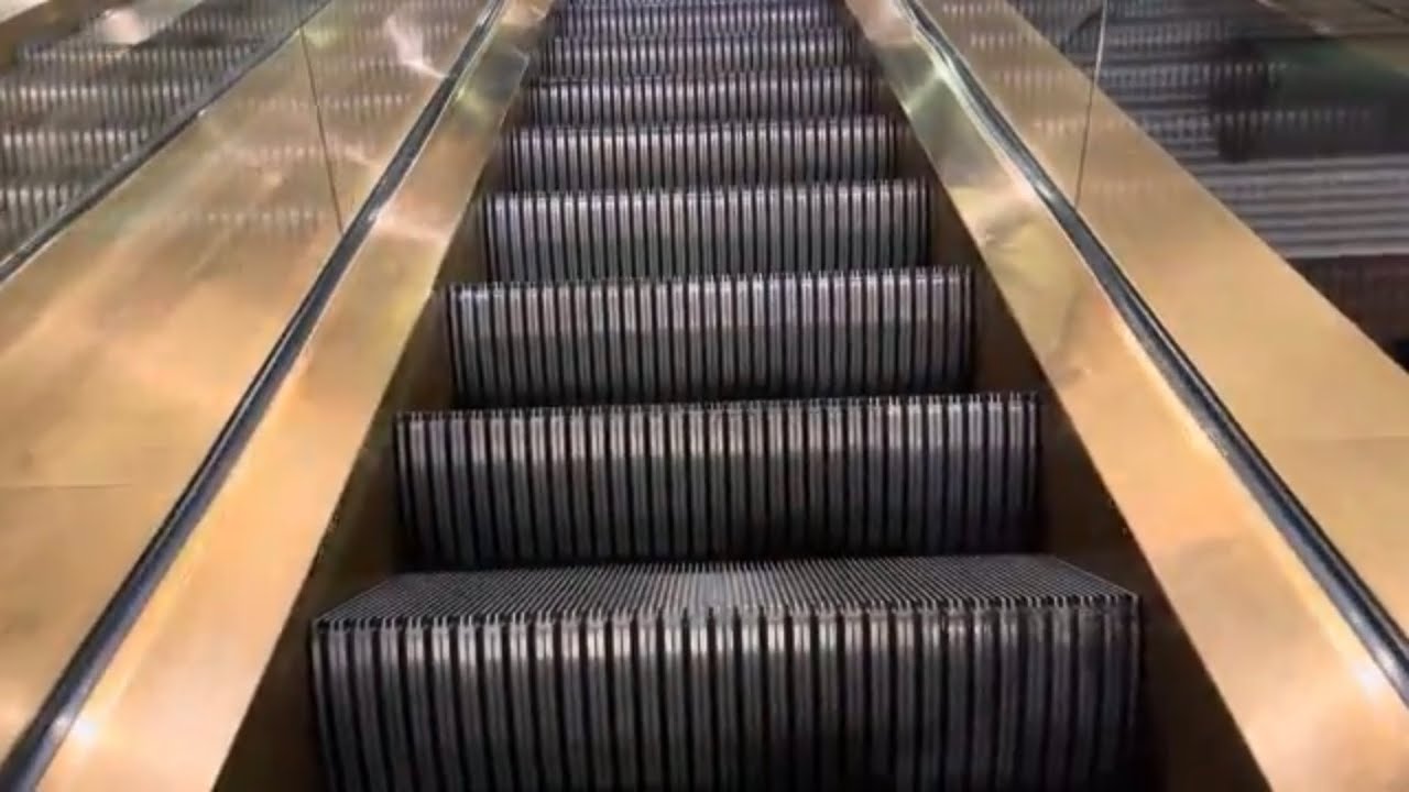 LONG 1989 Montgomery E5000 Escalators at Roots Food Pioneer Place ...