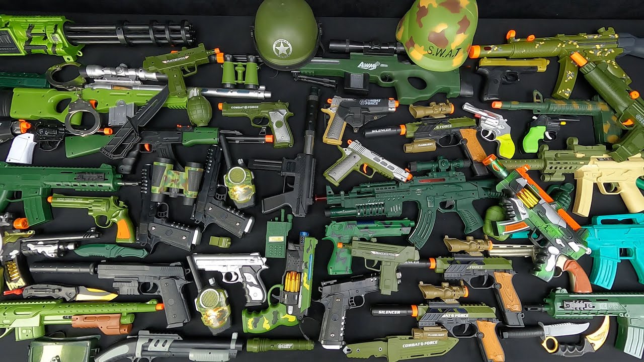 Toy Realistic Army Guns, Machine Guns, Sniper Rifles, Steel Helmets And ...