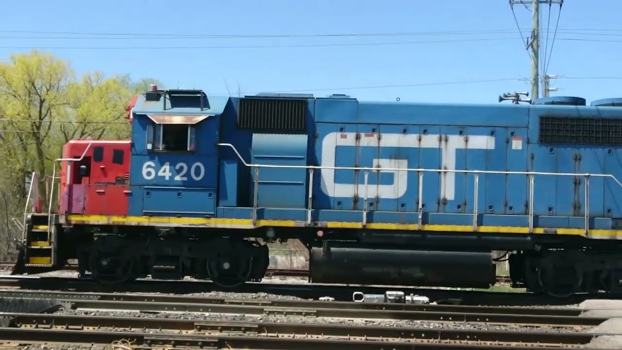 CN 554 EMD GT GP40 2L 6420 & GP38-2 4906 are heading westbound to ...