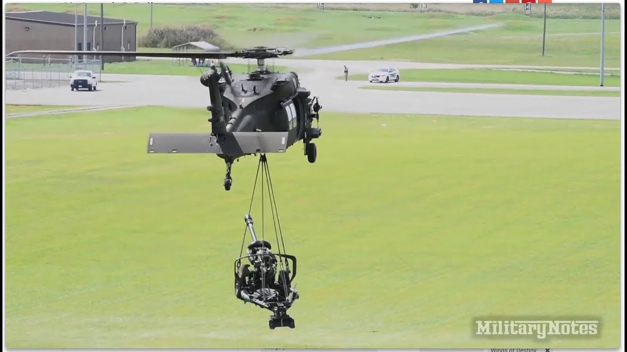 ARTILLERY AIR ASSAULT: UH-60 Blackhawks sling load M119A3 Howitzers ...