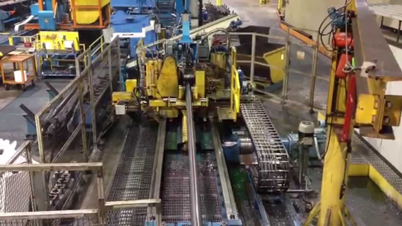 Flying cut off application on Oto Mills TAC90 Twin cut. Blade diam. 550 ...