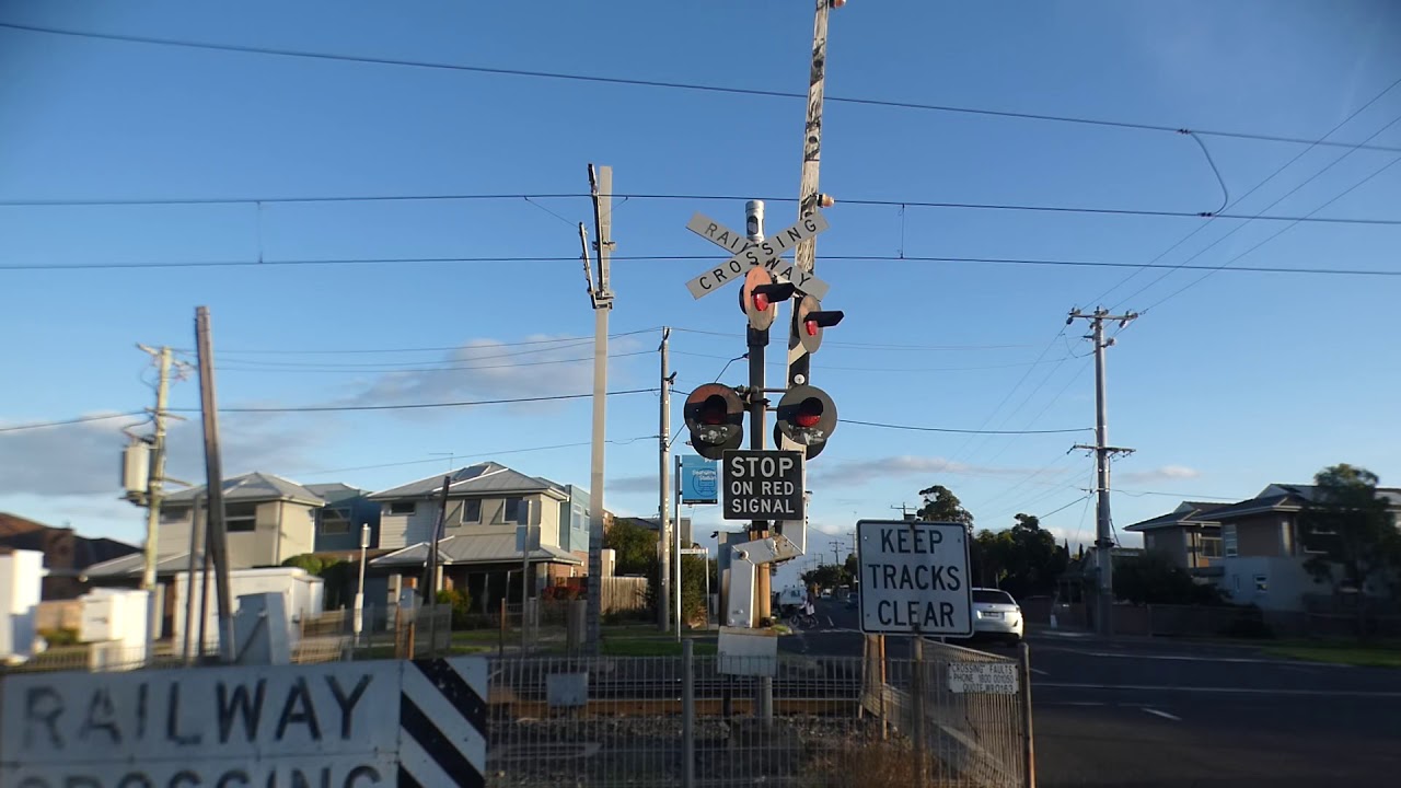 Seaholme Railway Crossing with the Rare Black And White Boomgates Video ...