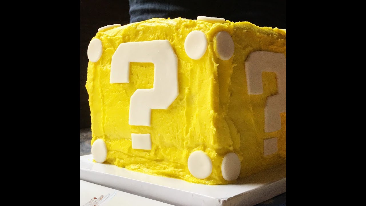Super Mario Bros. Question block cake with chocolate gold coins inside ...