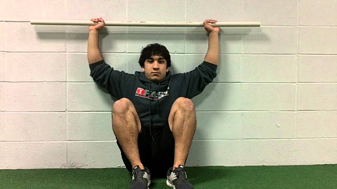 Wall sit with shoulder flexion and shoulder press - YouTube