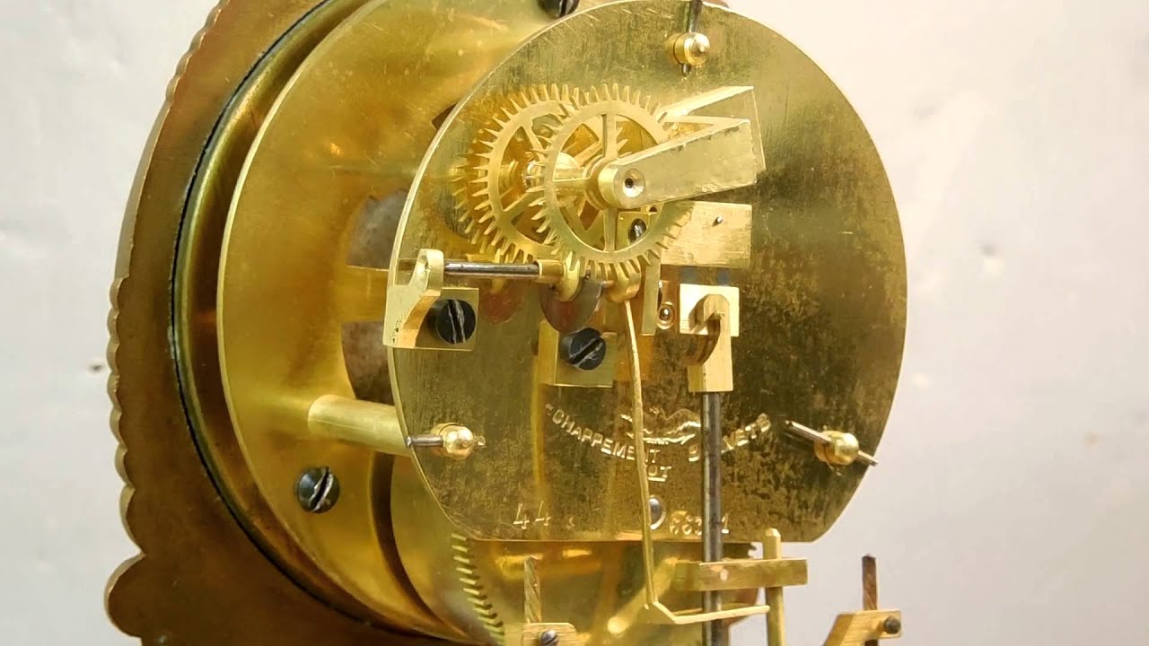 Interesting double wheel escapement on French Cupid swinger. - YouTube