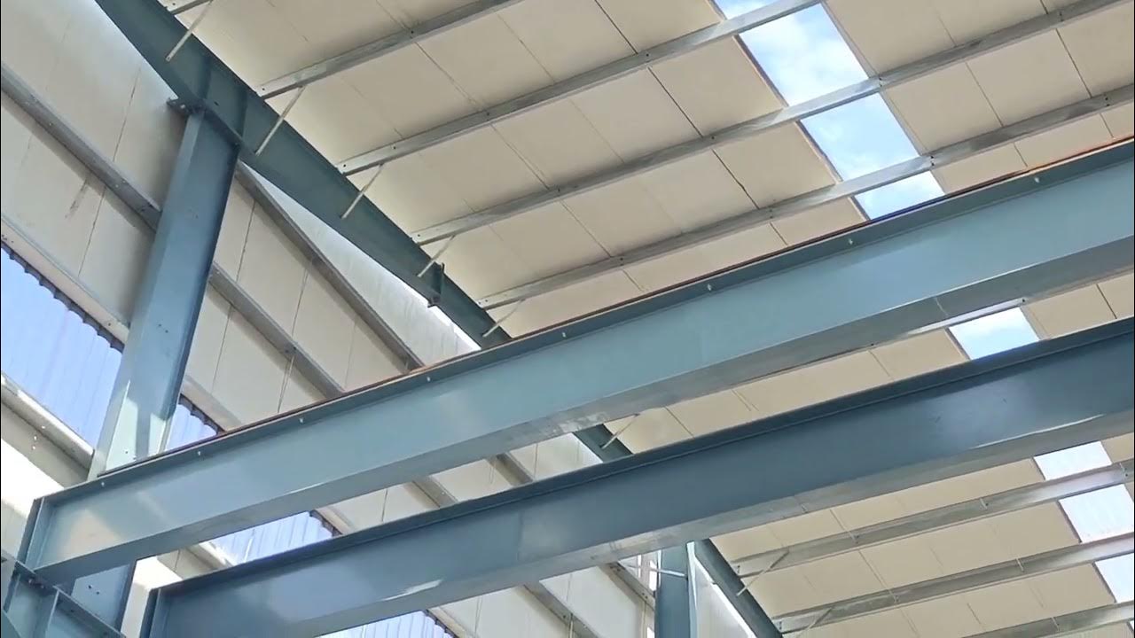 Installation of crane in PEB structure... - YouTube