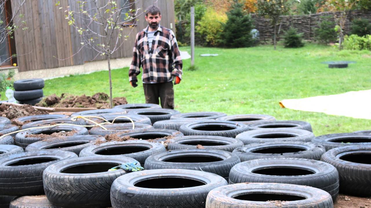 Taluz de anvelope cu pamant compactat la Green Mogo - YouTube