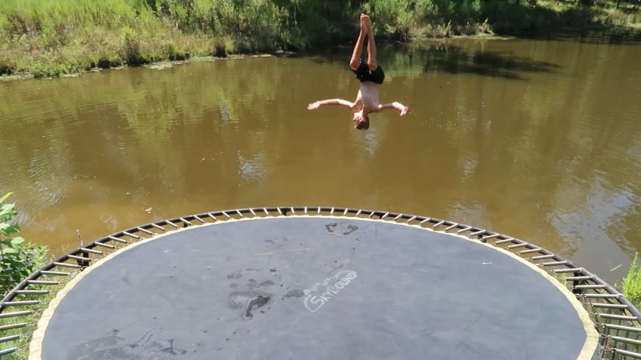 I PUT A TRAMPOLINE BY A POND! - YouTube