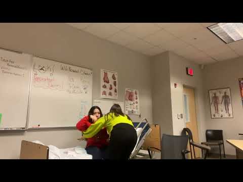 Helping a patient transfer to a wheelchair, dangle off side of bed, and ...