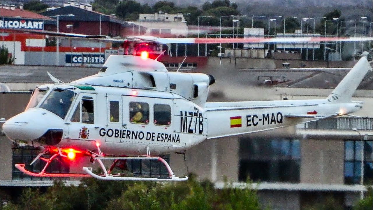 Bell 412 EC-MAQ helicopter landing at dusk - YouTube
