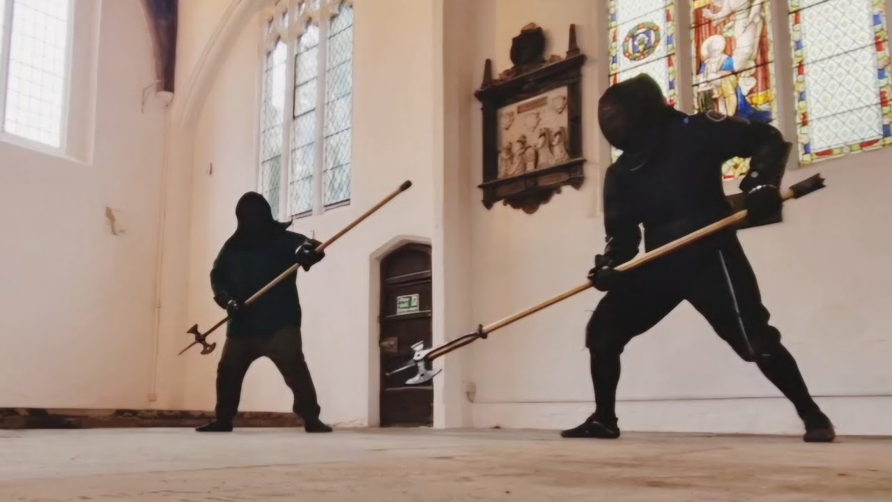 HEMA poleaxe free sparring in a medieval building. - YouTube