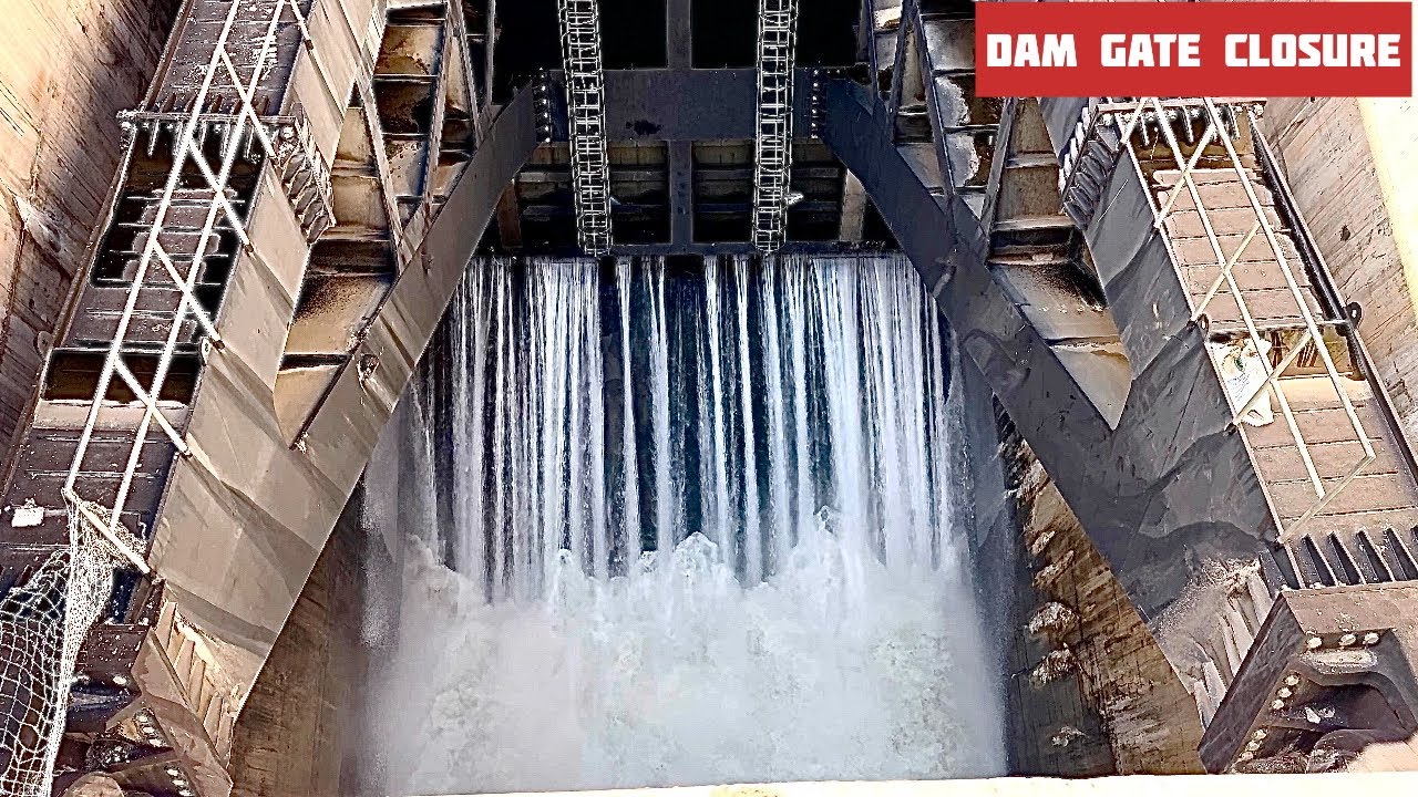 FLOOD DISCHARGE ENDS WITH DAM GATE CLOSURE - YouTube