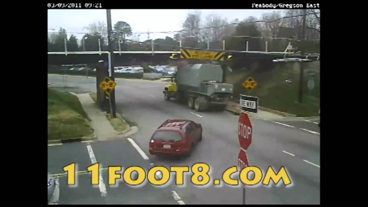 speeding truck bends 11foot8 crash beam - YouTube