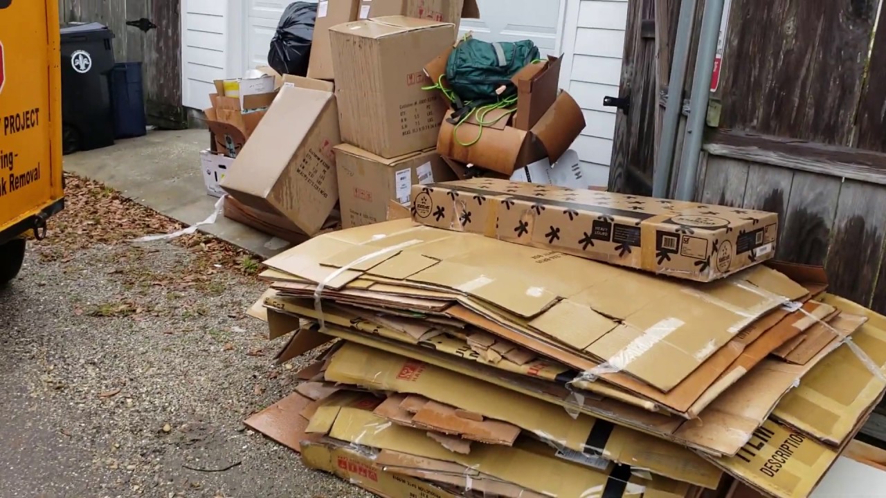 Junk Removal Hauling Cardboard Boxes in New Orleans Lakeview Area - YouTube