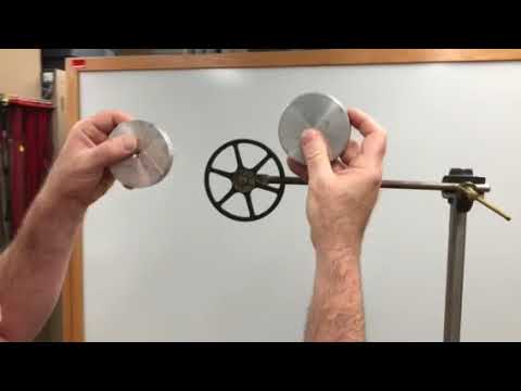 Two Falling Discs Brown University Physics Demonstration - YouTube