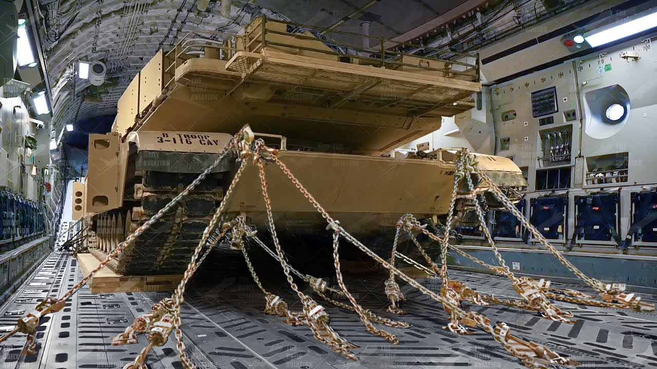 Massive US M1 Abrams Tank Chained Like a Monster During Air Lift in C ...
