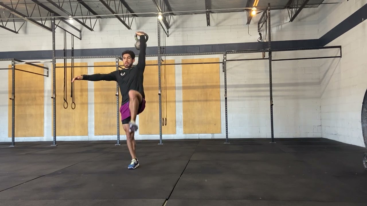Single arm overhead KB march - YouTube
