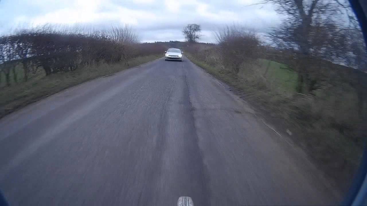 Dodging potholes at high speed - YouTube