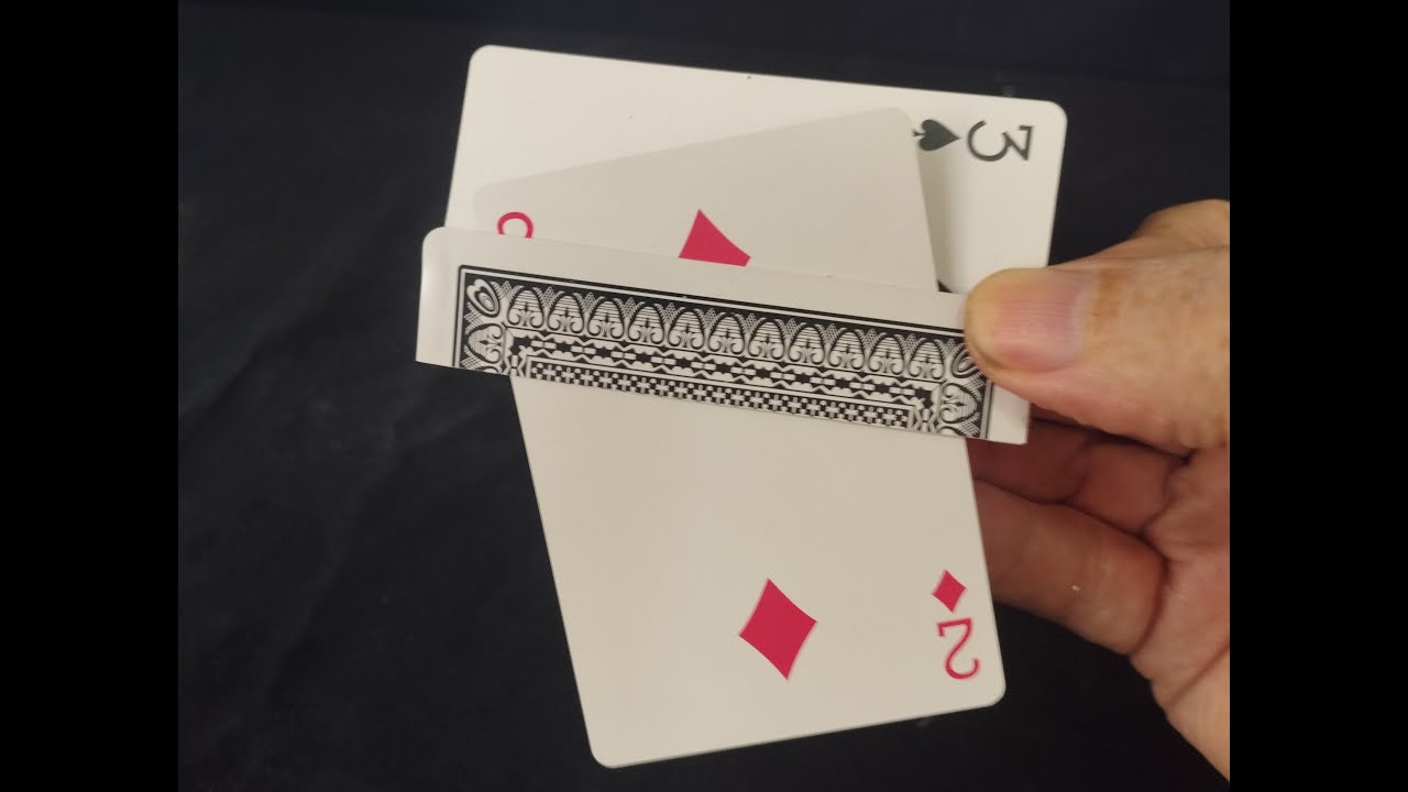 Impossible card through card trick. Magic tricks revealed - YouTube