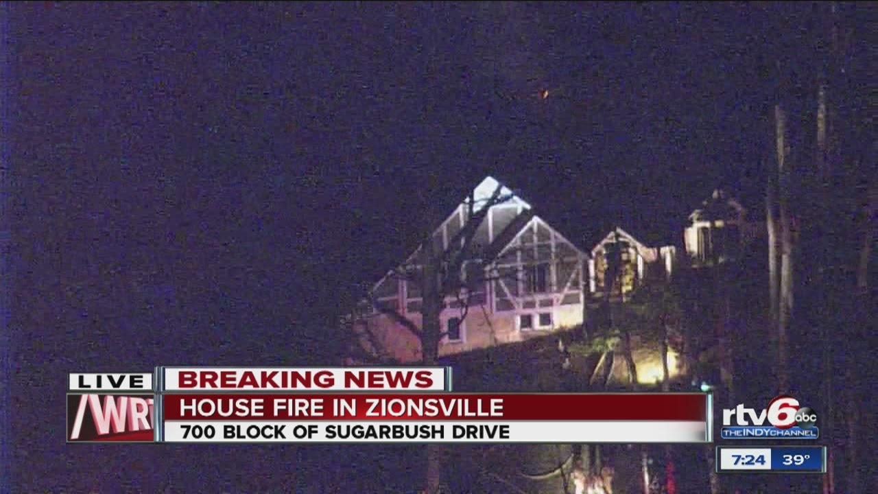 Firefighters battle blaze inside Zionsville home - YouTube