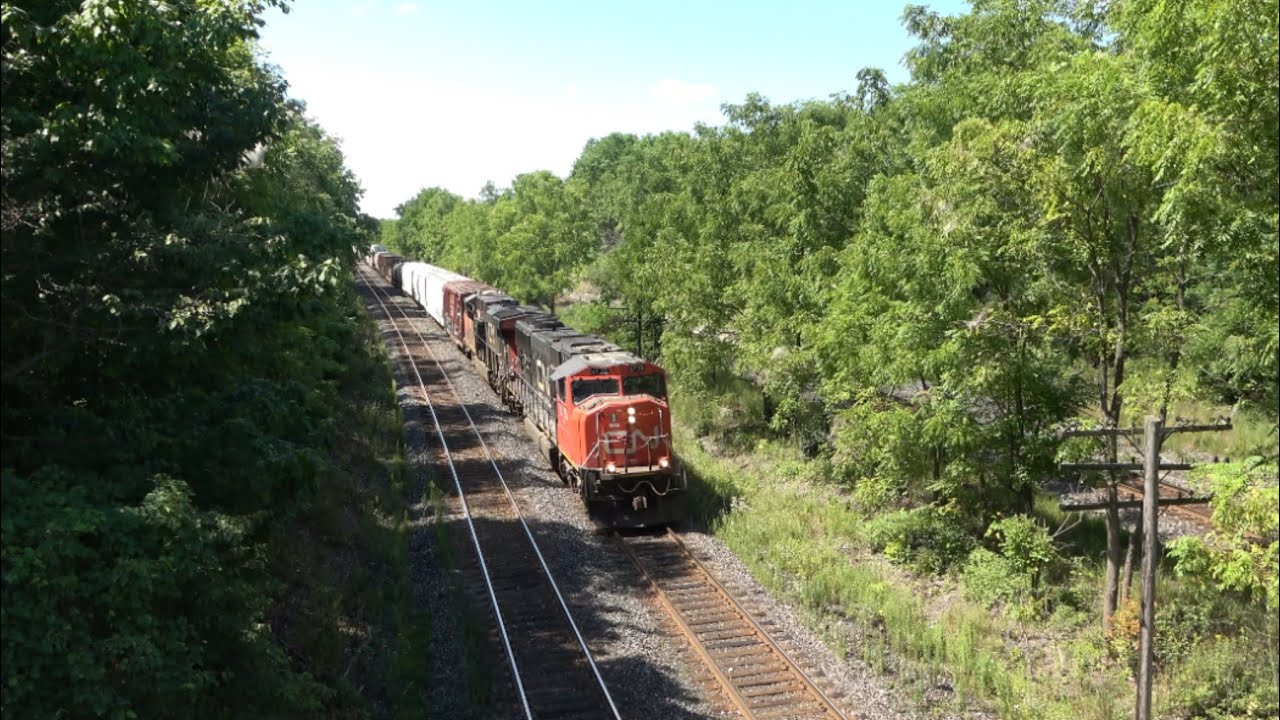 Horn greeting from CN railway train w/ 5775 & 2335 as power. Denfield ...