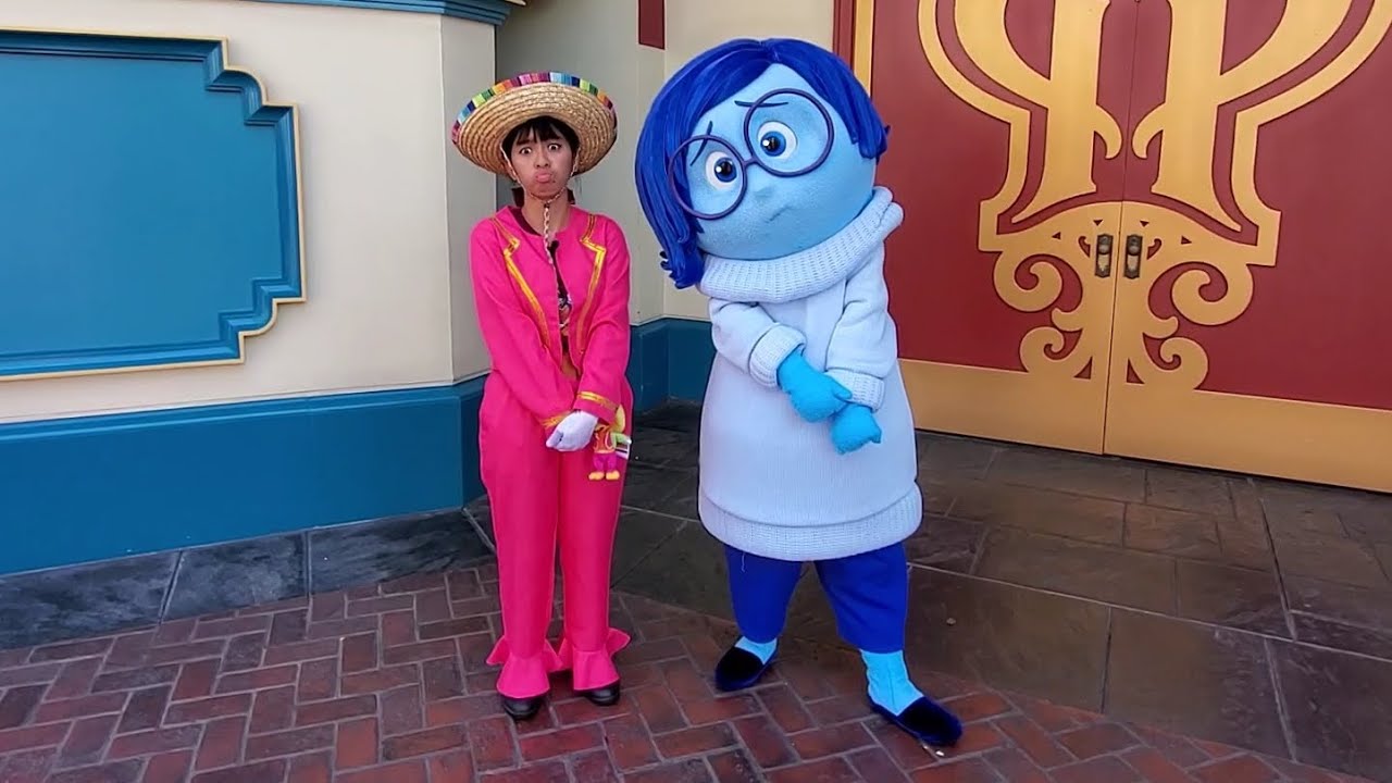 I as a caballera meets Sadness from Pixar Inside Out at DCA 2023 - YouTube