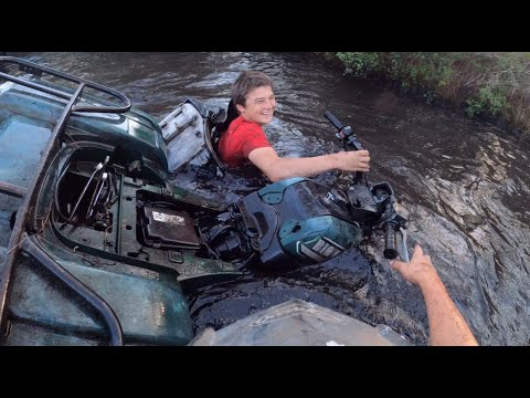 KID FLIPS HIS FOUR WHEELER AND SINKS IT IN A DEEP WATER HOLE !!! best ...