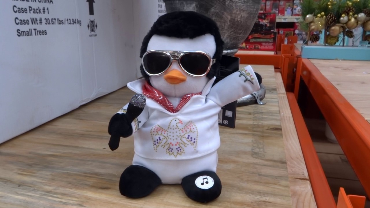 Penguin Elvis animated toy - YouTube