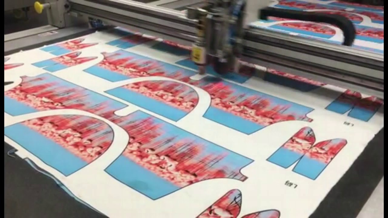CUTTERS FOR FABRIC: Single-ply cutting conveyorized system - YouTube