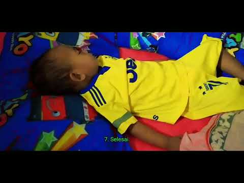 Ganti Popok si Dedek yang lagi tidur