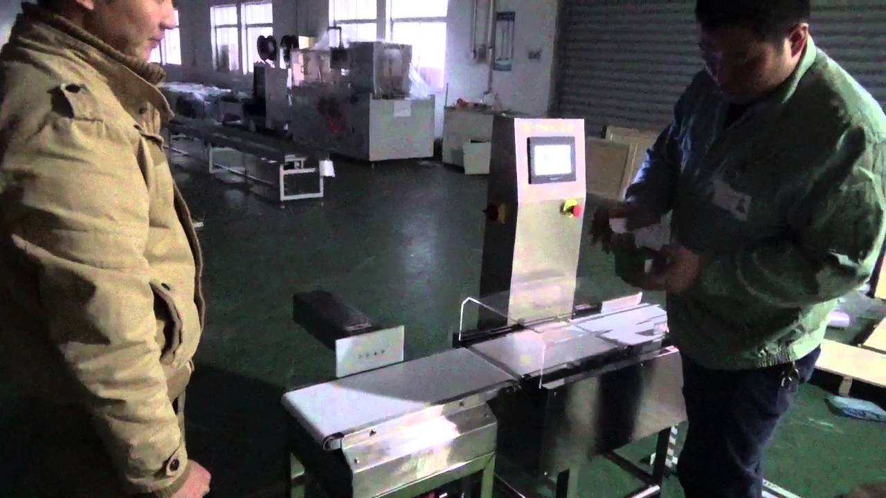 automatic online weight checker machine for packing system - YouTube