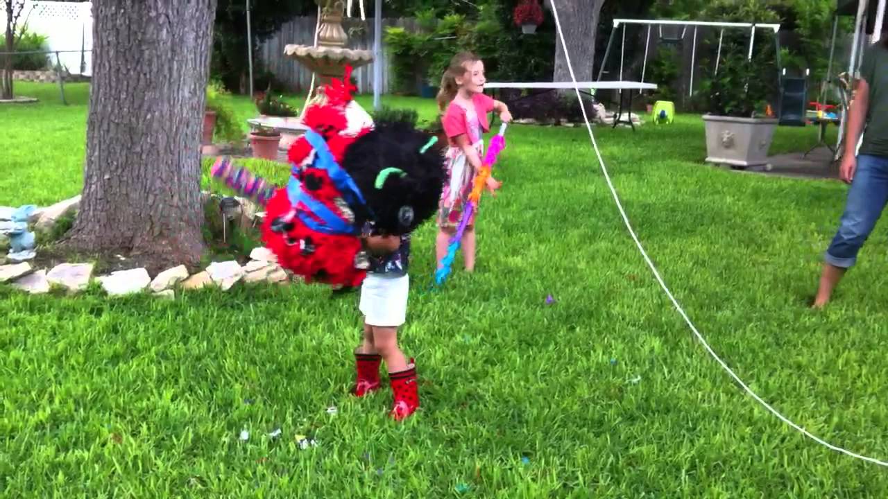 Nola takes a swing at piñata - YouTube