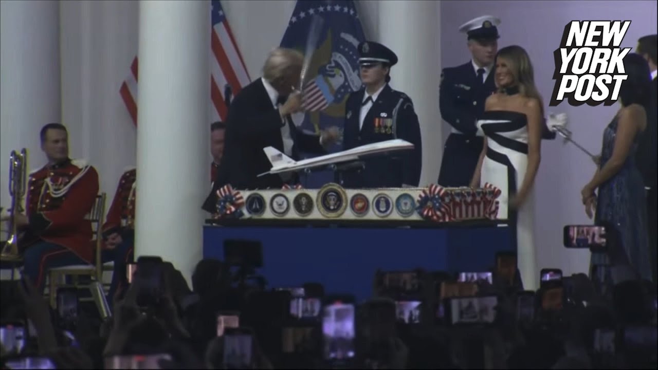 Donald Trump dances with sword after cutting cake at inaugural ball ...