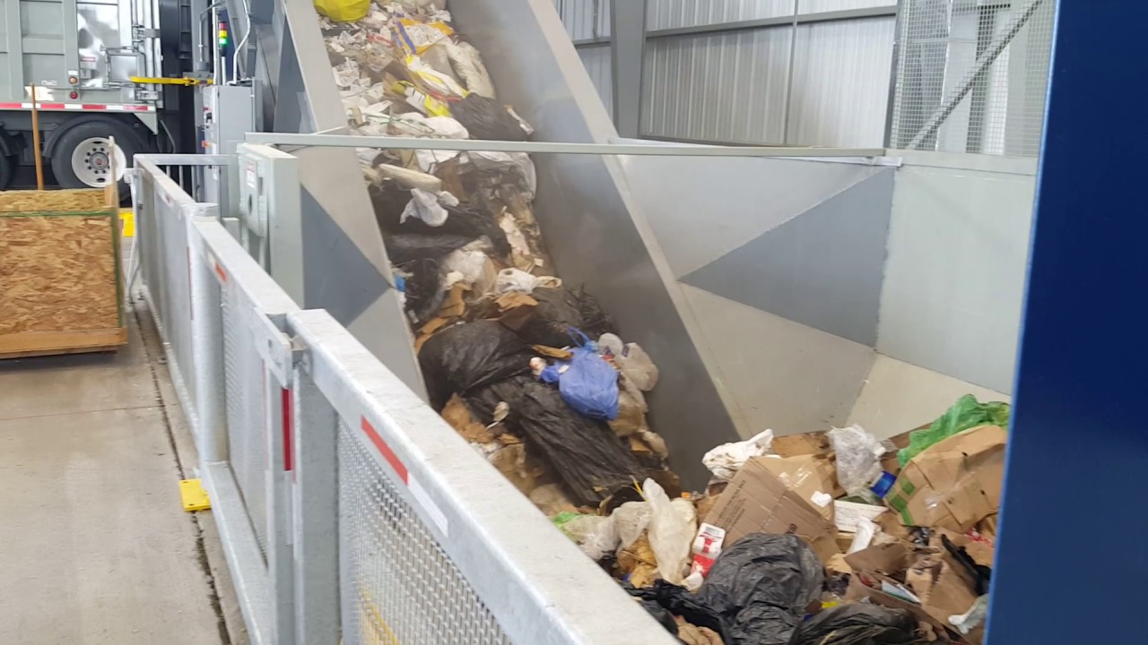 Transfer Station MSW Offloading to Conveyor - YouTube