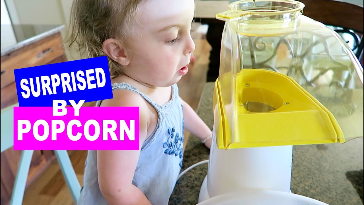 BABY IS SURPRISED BY POPCORN POPPER - YouTube