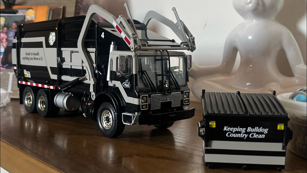 First gear Mack MR front loader. - YouTube