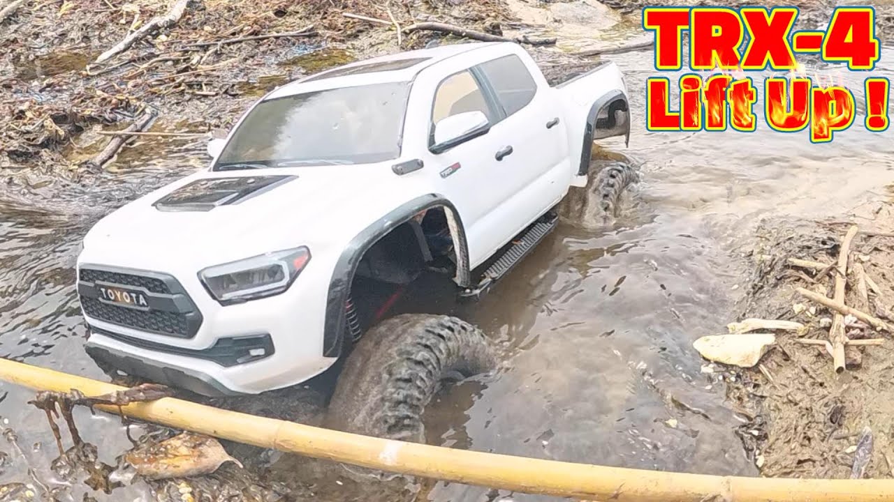 I installed a long arm lift kit on a Traxxas TRX-4 . Muddy road test ...